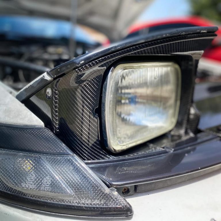 Carbon fiber headlights surround and cooling panel